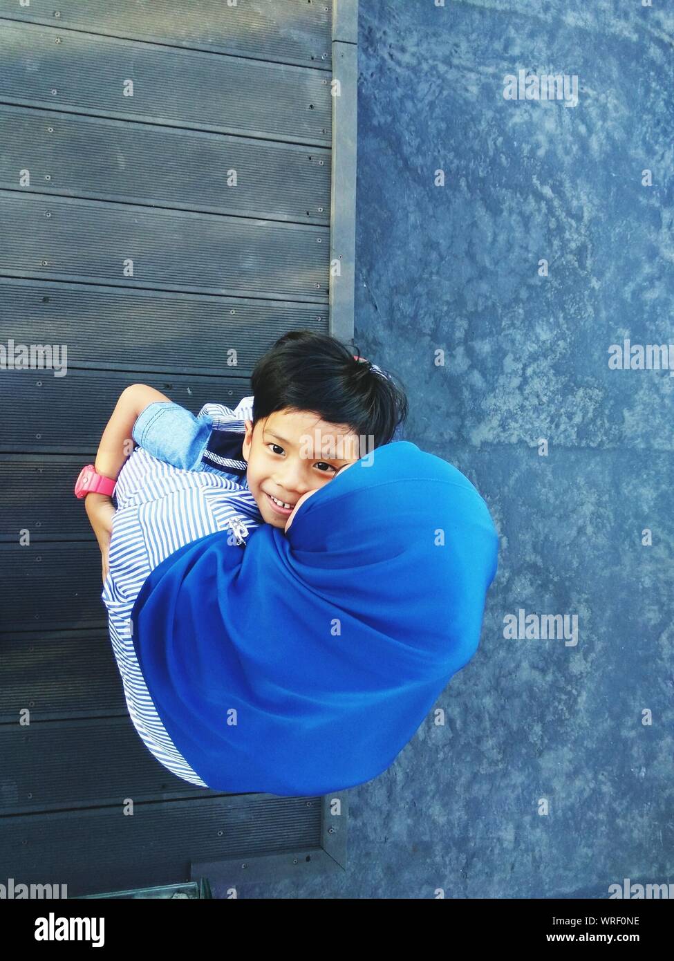 Child carried by his mother hi-res stock photography and images - Alamy