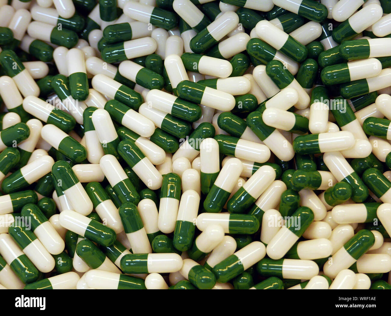 Green capsules hi-res stock photography and images - Alamy
