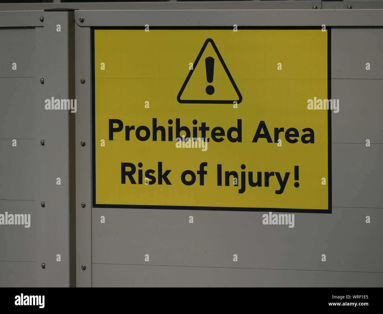 building sign Risk of injury Stock Photo - Alamy