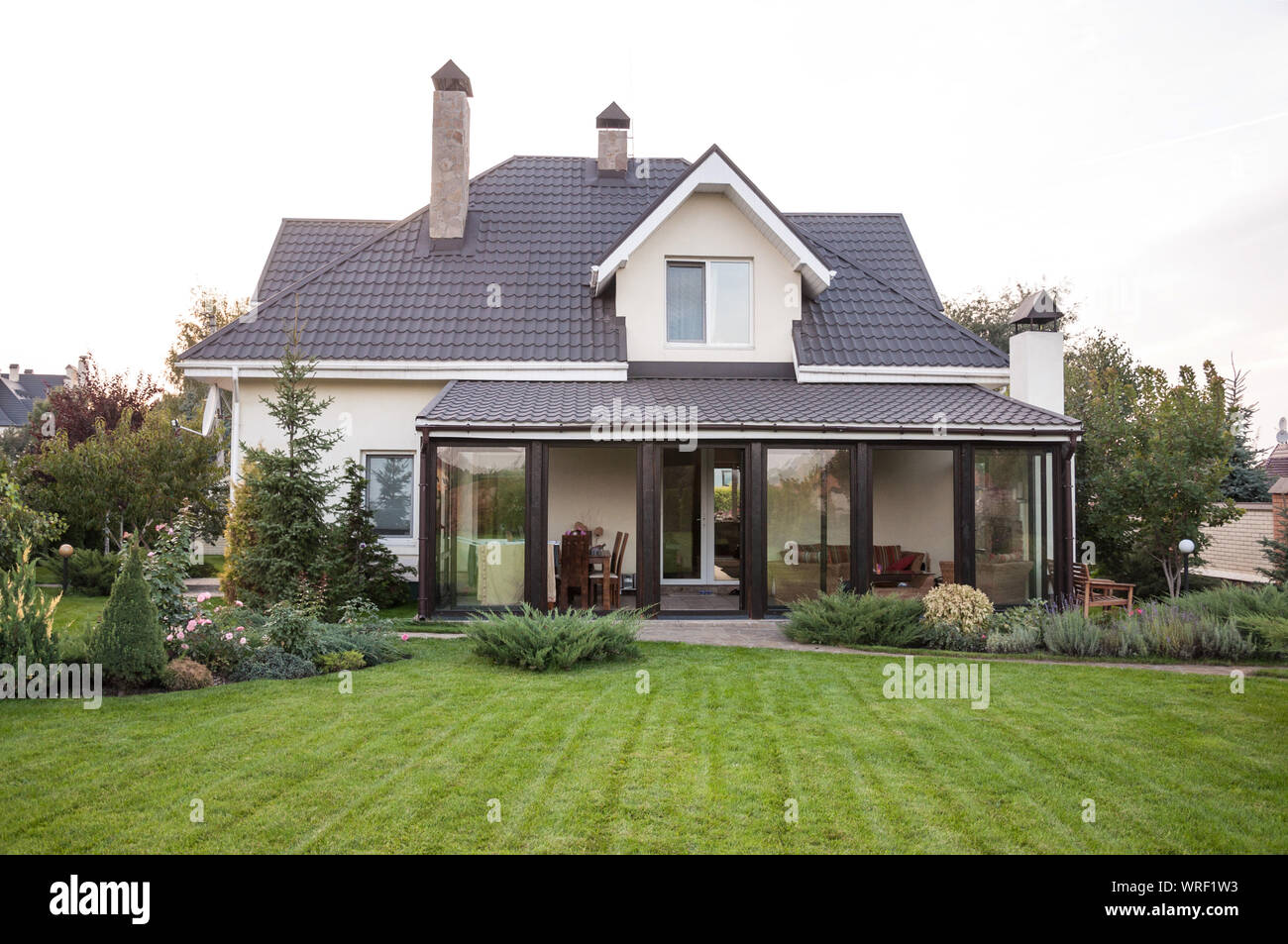 A private house with a garden in a rural area Stock Photo - Alamy