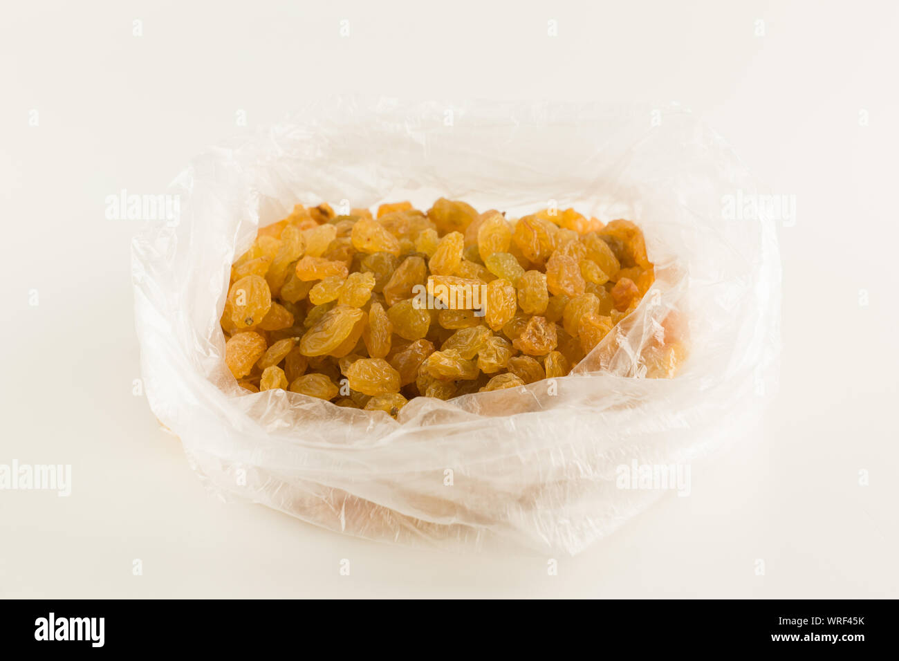 Fresh picked raisins isolated on white background and ready to eat ...