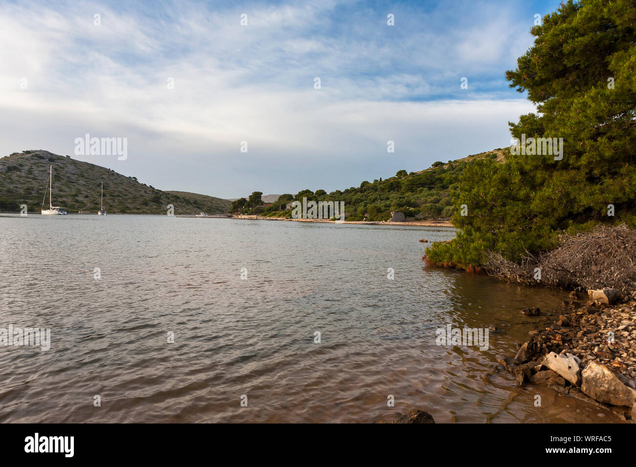 A quiet anchorage on the island of Otok Lavsa, Kornati National Park ...
