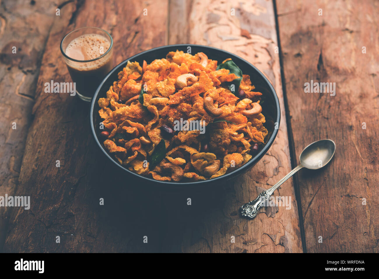 Cornflake Chivda or Corn Chiwda loaded with peanuts and Cashew. Served ...