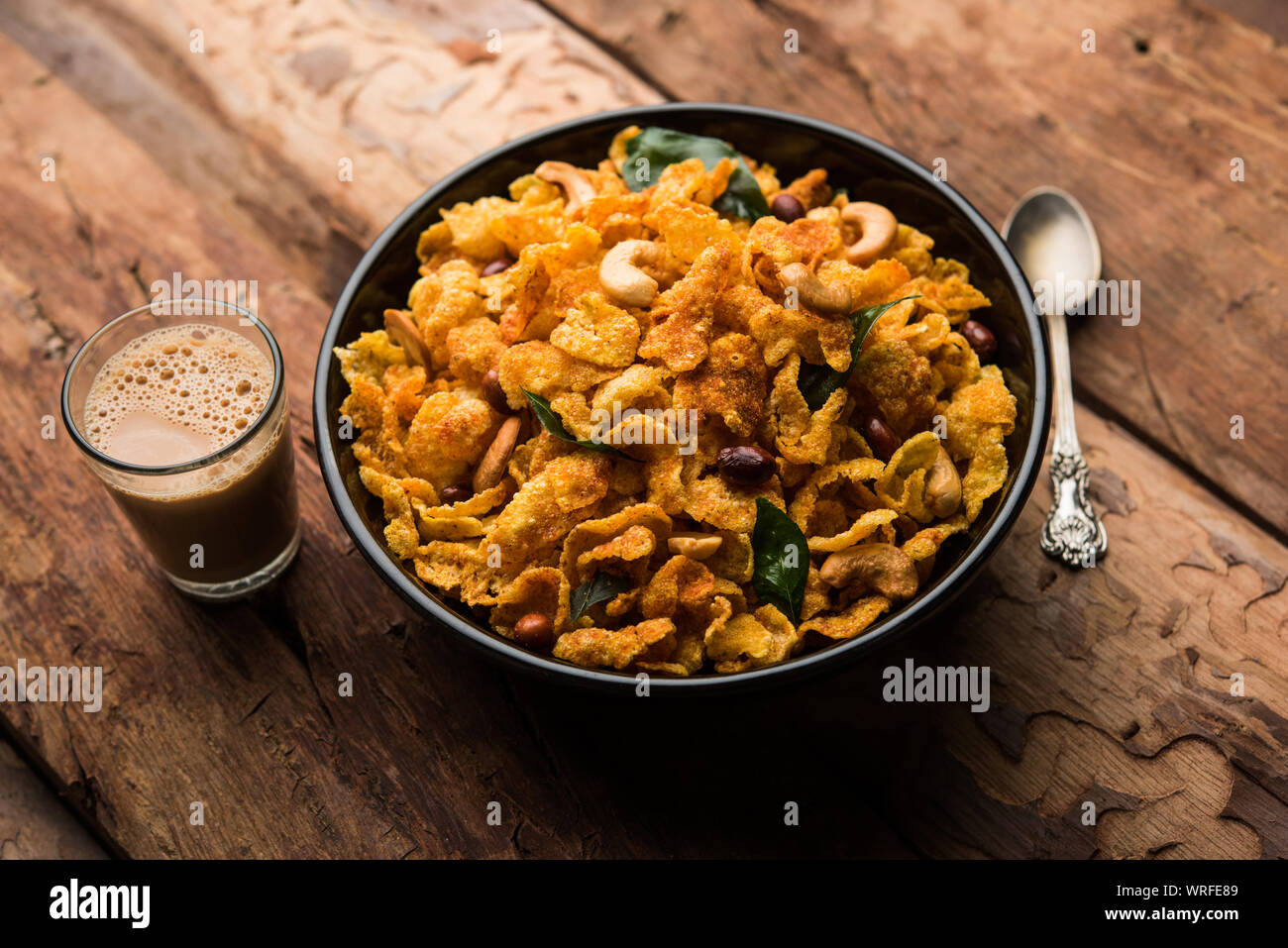 Cornflake Chivda or Corn Chiwda loaded with peanuts and Cashew. Served ...