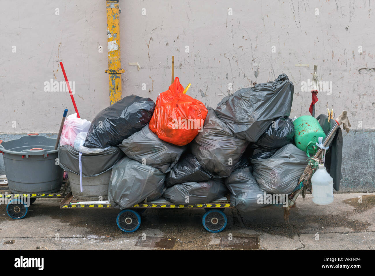 Pile of Garbage Bags Trash at Cart Stock Photo - Alamy