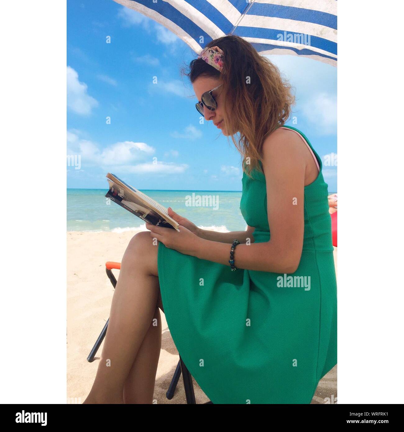 Young Adult Reading Beach High Resolution Stock Photography and Images ...