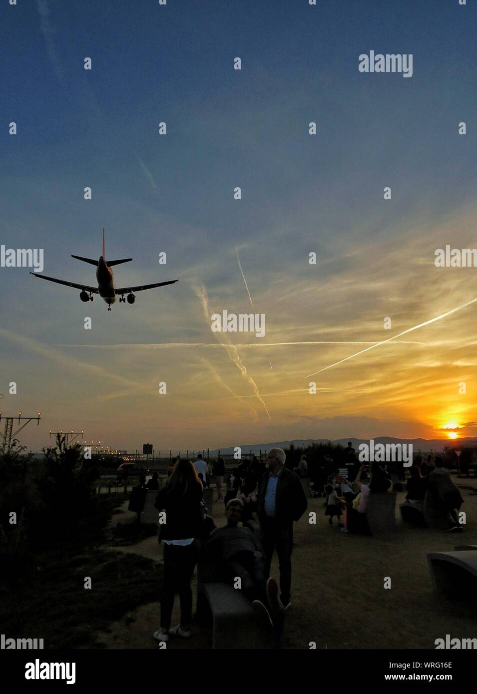 People standing watching sunset hi-res stock photography and images - Alamy