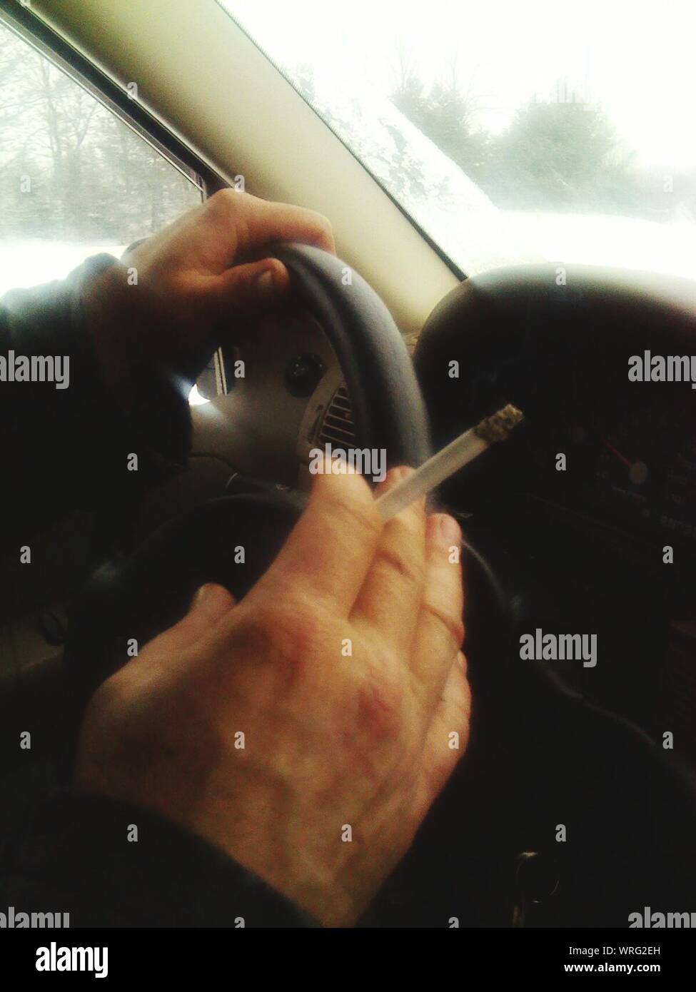 Driver Smoking Cigarette High Resolution Stock Photography and Images ...