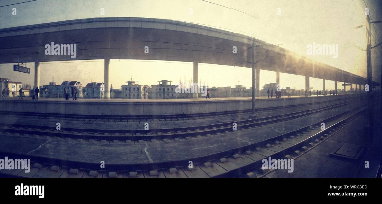 Side View Of People Walking On Railway Station Platform Stock Photo - Alamy