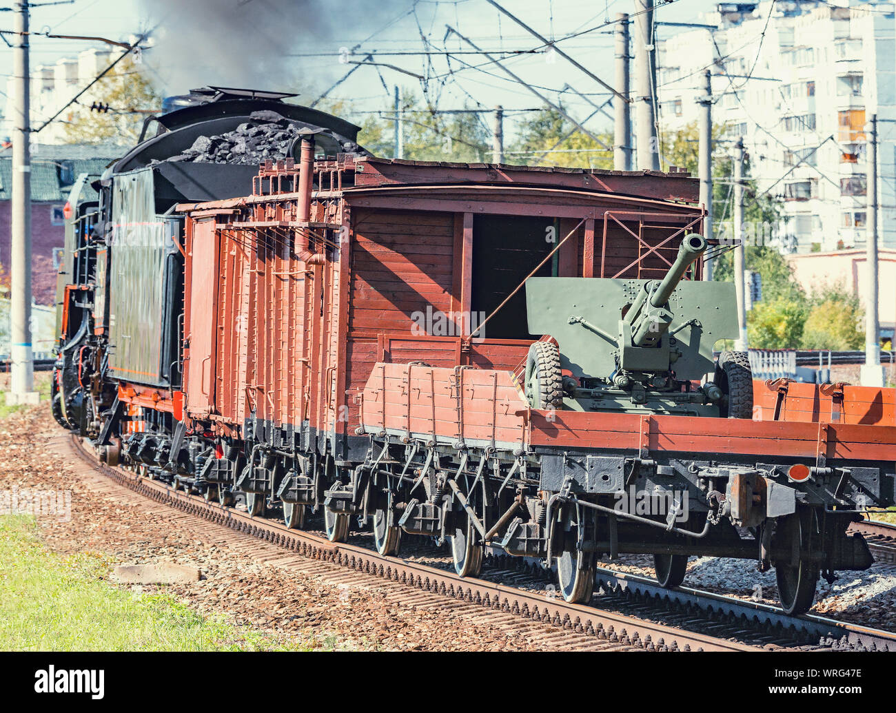 Retro steam freight train departs from the railway station with ...