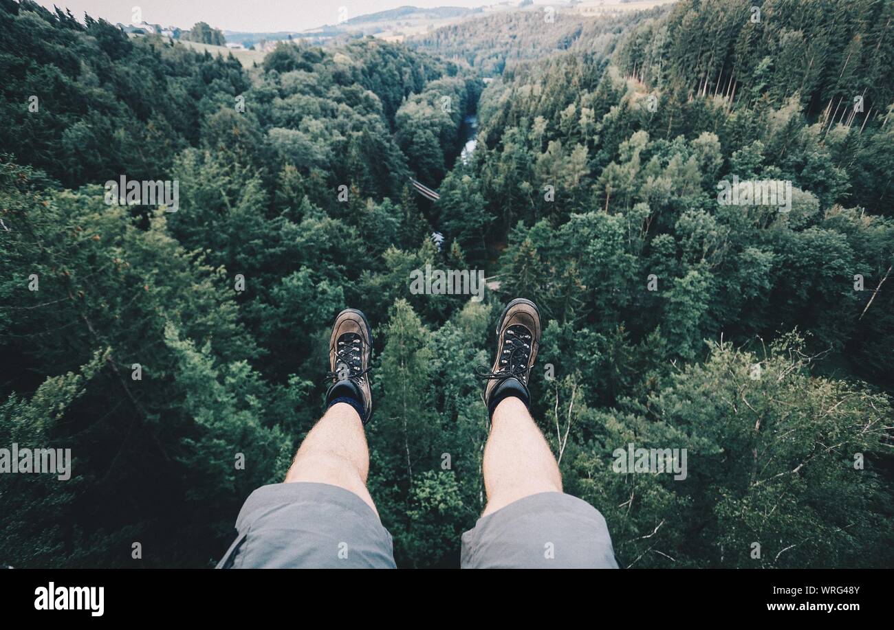 Hanging man legs hi-res stock photography and images - Alamy