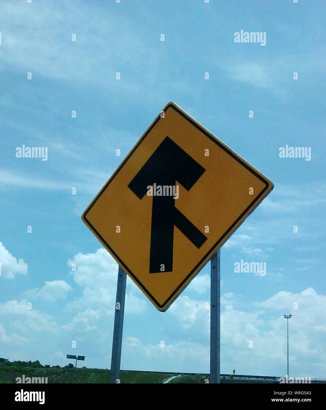 Merging road sign hi-res stock photography and images - Alamy