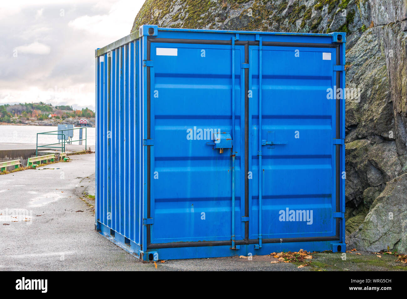 One Blue Cargo Container at Coast in Sweden Stock Photo - Alamy