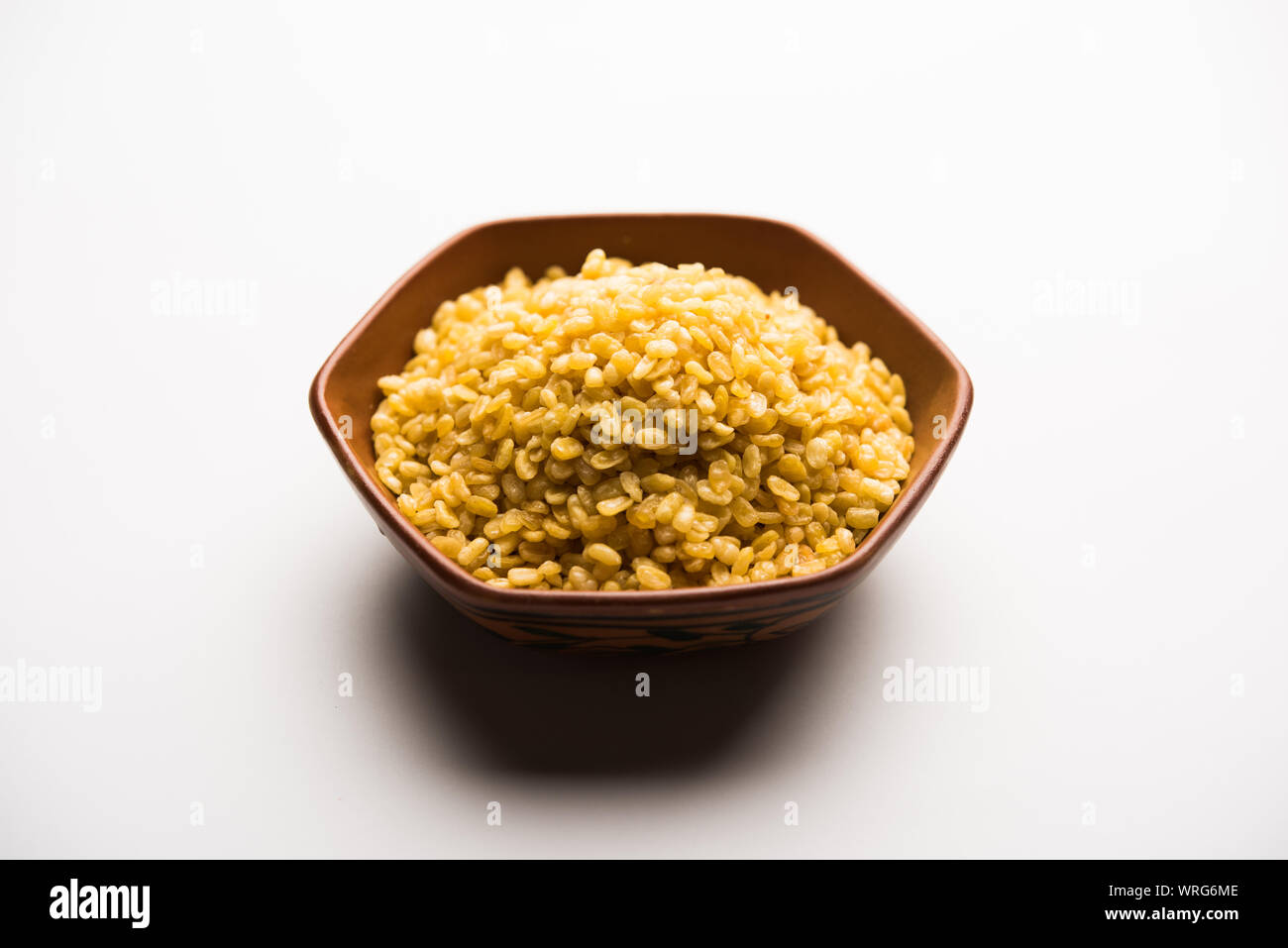 Salty and Fried Moong Dal / crispy Mung Namkeen served in a bowl ...