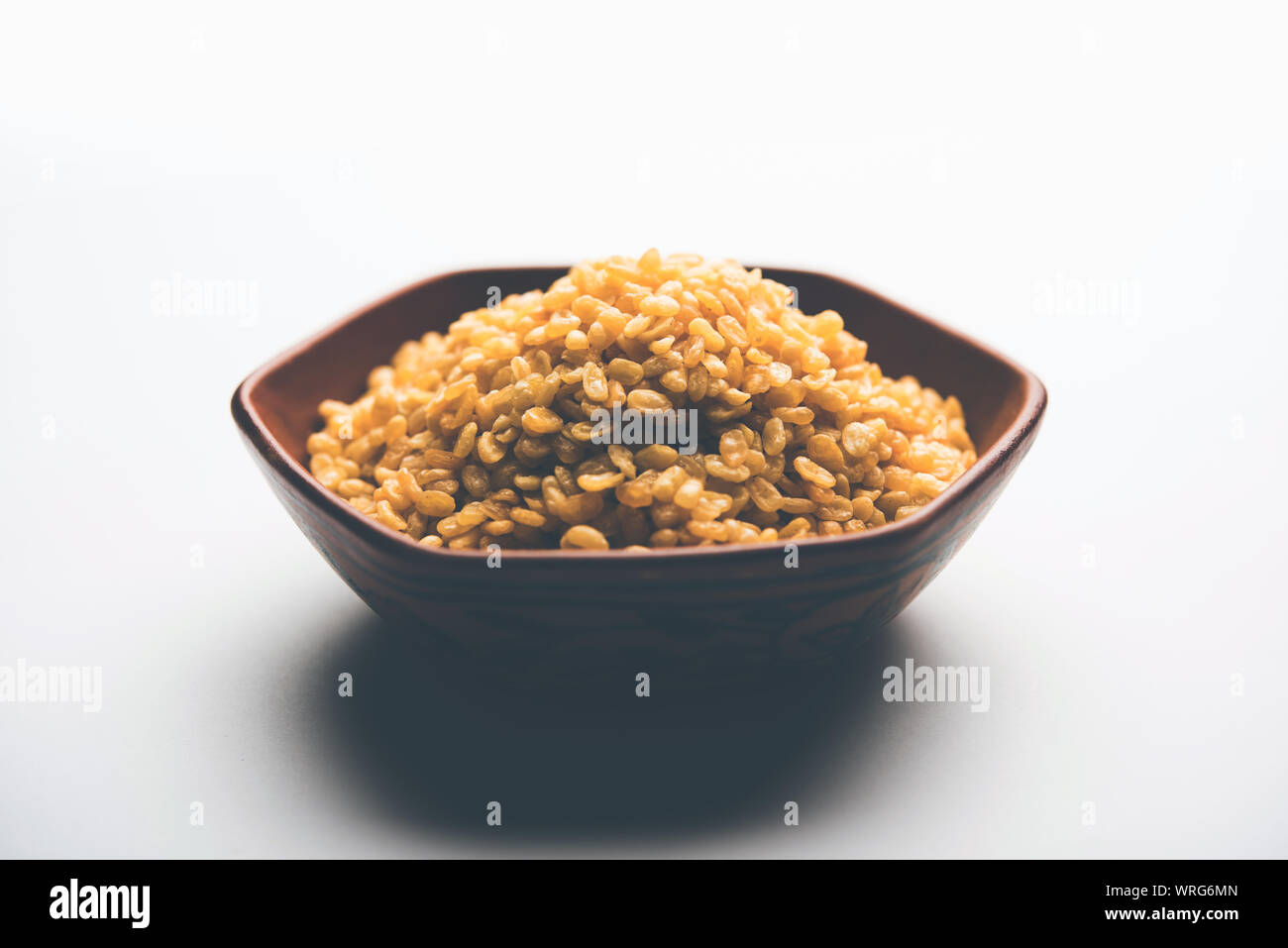 Salty and Fried Moong Dal / crispy Mung Namkeen served in a bowl ...