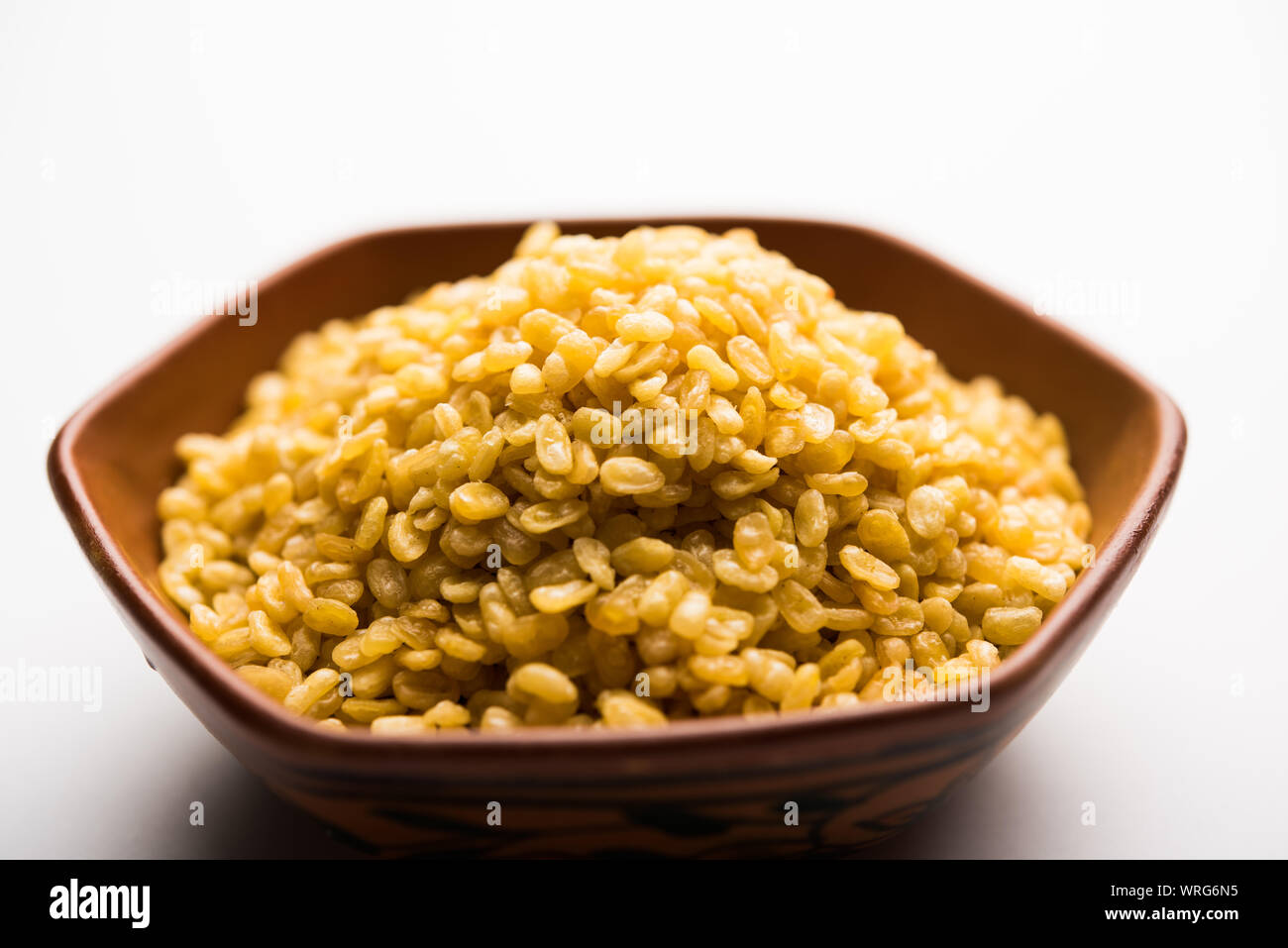 Salty and Fried Moong Dal / crispy Mung Namkeen served in a bowl ...