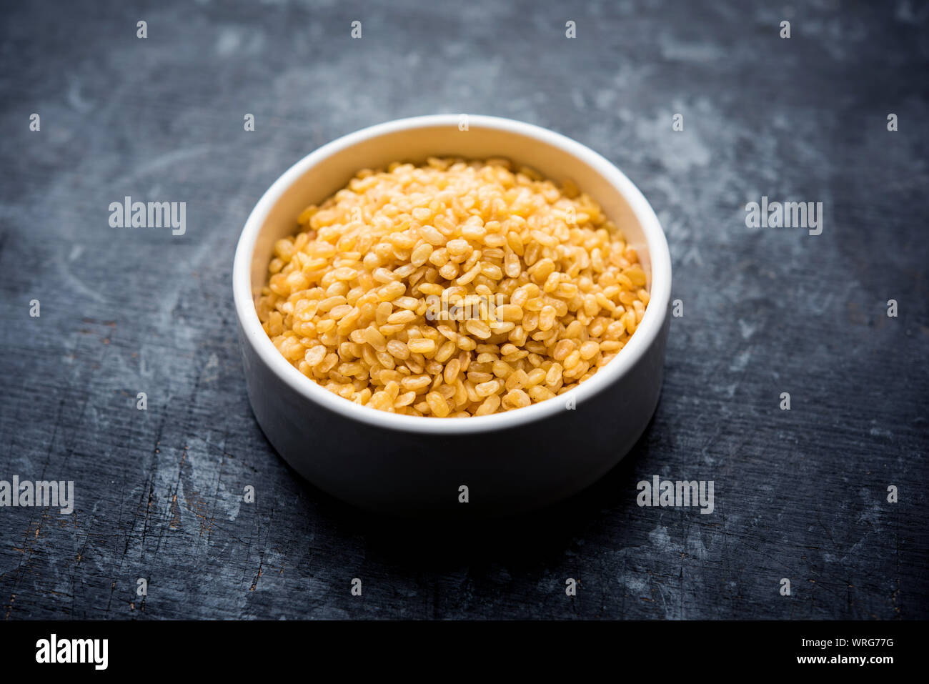 Salty and Fried Moong Dal / crispy Mung Namkeen served in a bowl ...