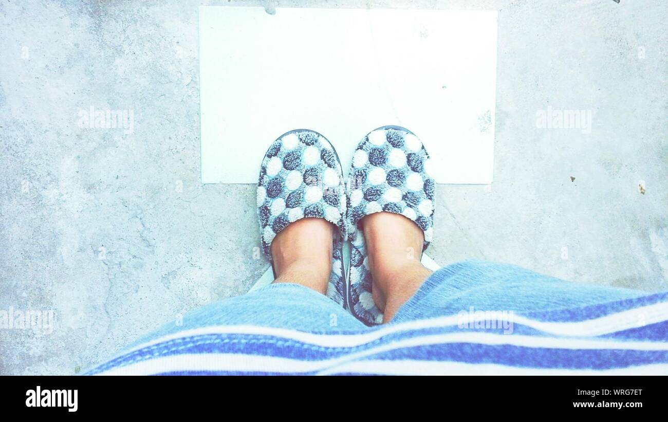 Woman Wearing Slippers High Resolution Stock Photography and Images - Alamy