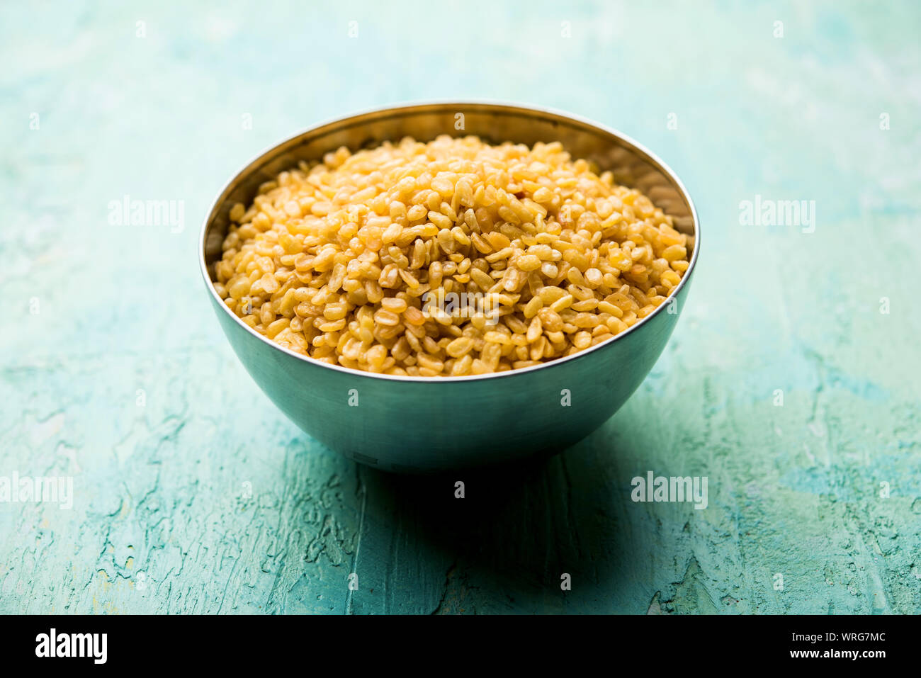 Salty and Fried Moong Dal / crispy Mung Namkeen served in a bowl ...