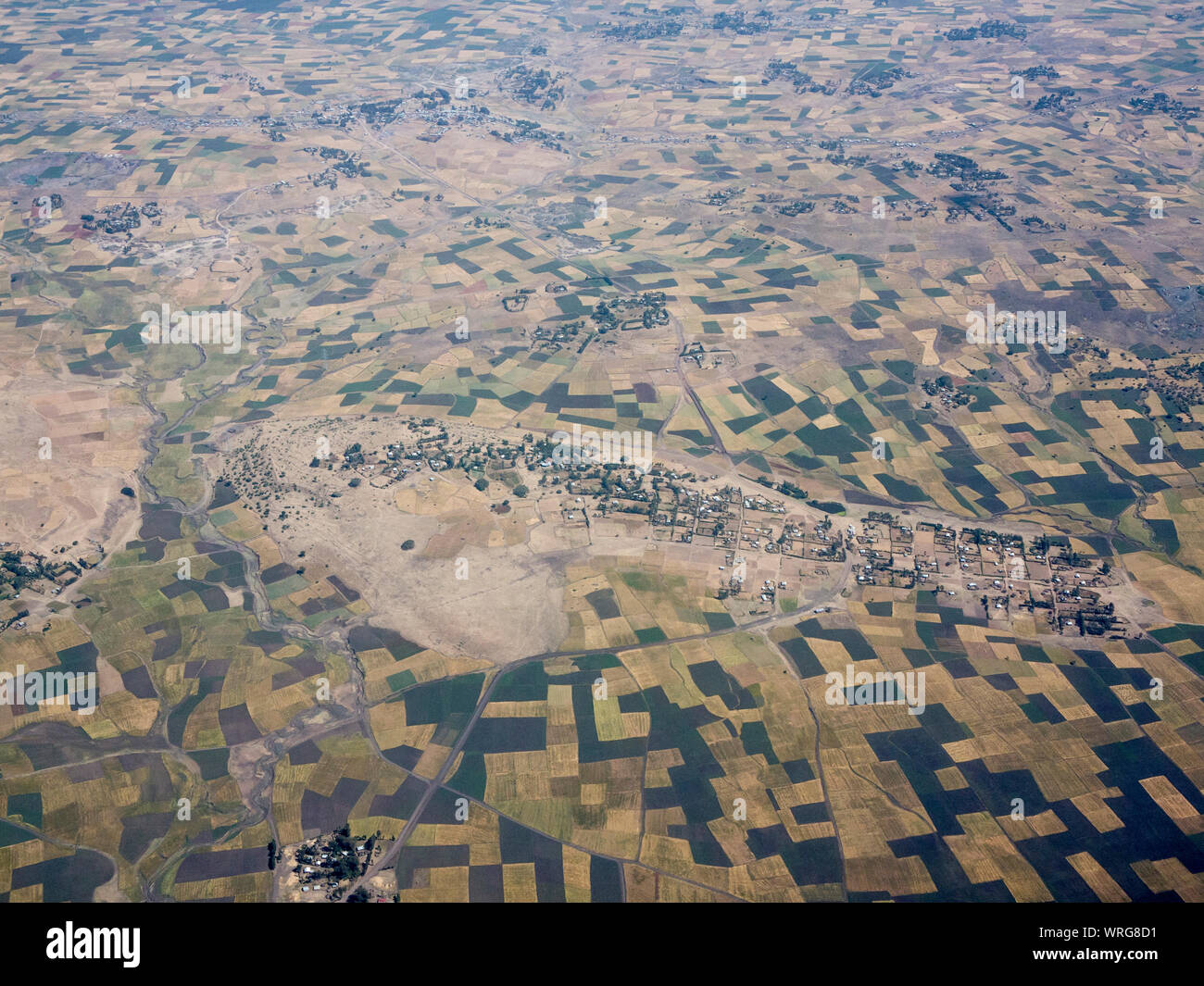 High aerial view of farms and village in Africa Stock Photo - Alamy