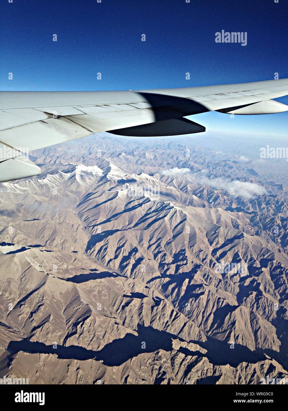 Flying above mountains hi-res stock photography and images - Alamy