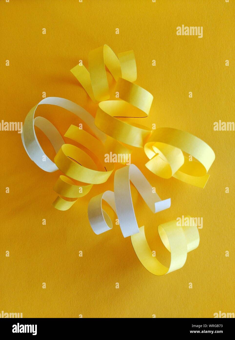 Yellow spiral design hi-res stock photography and images - Alamy