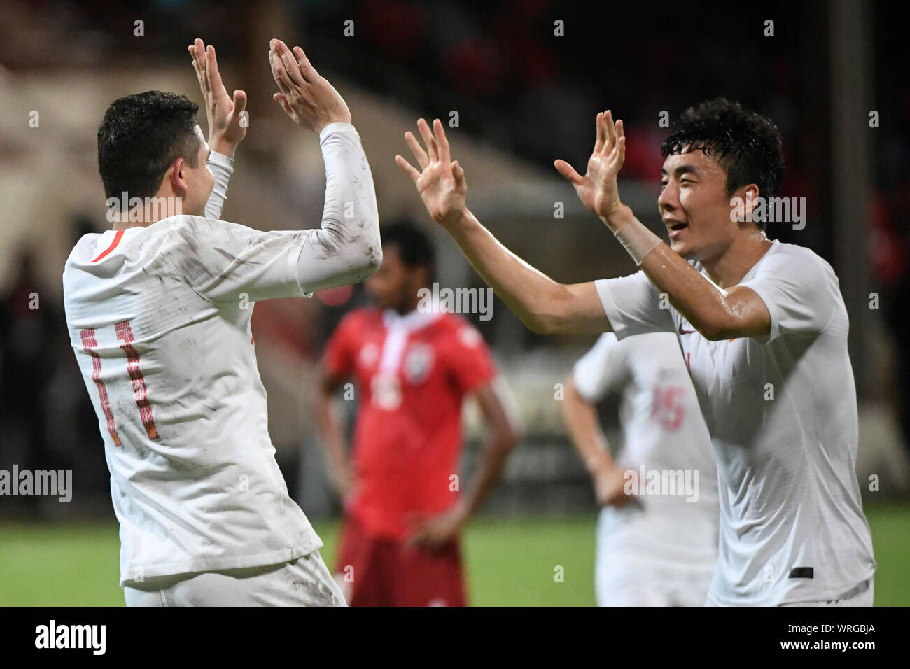 Male, Maldives. 10th Sep, 2019. Ai Kesen (L) of China celebrates his ...