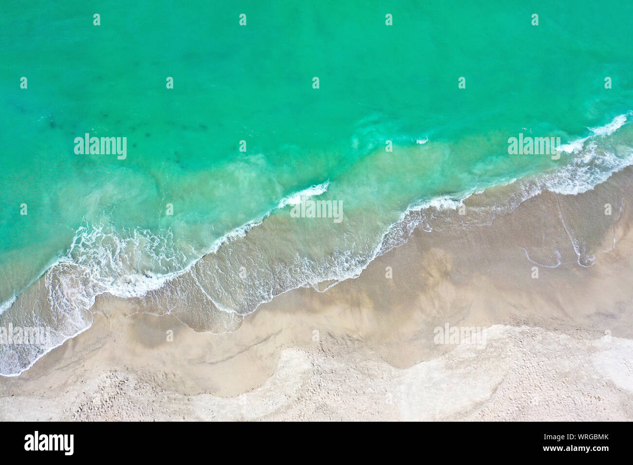 Aerial Photo of the Beach of Anna Maria Island with the Ocean Surf ...
