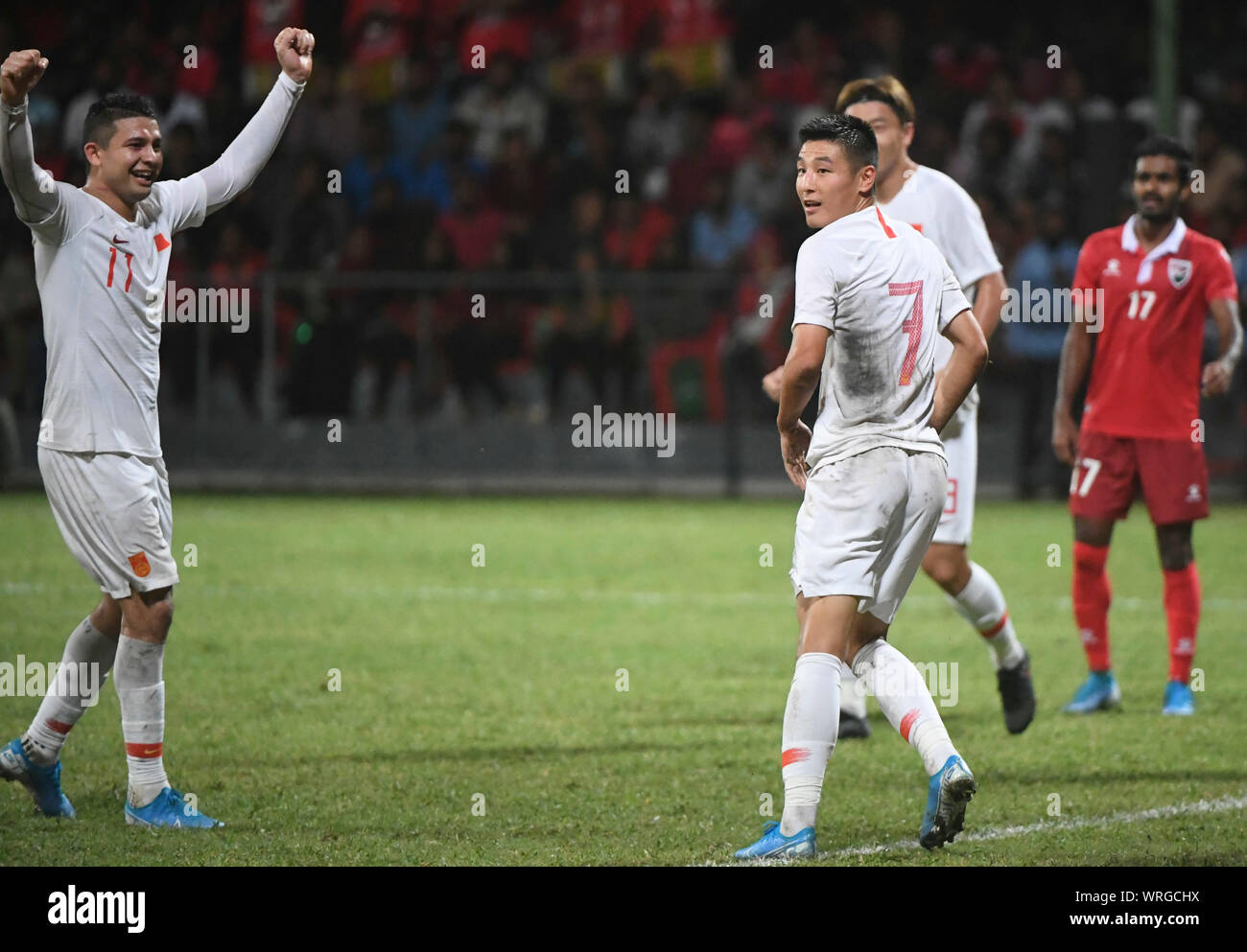 Male, Maldives. 10th Sep, 2019. Wu Lei (2nd L) of China celebrates with ...