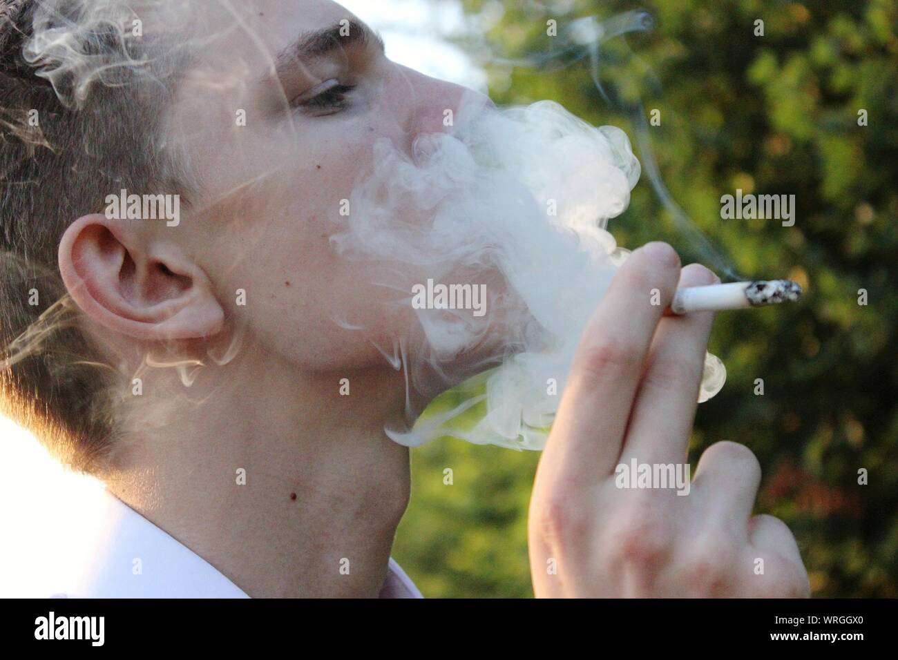 Cigarette smoking boys hi-res stock photography and images - Alamy