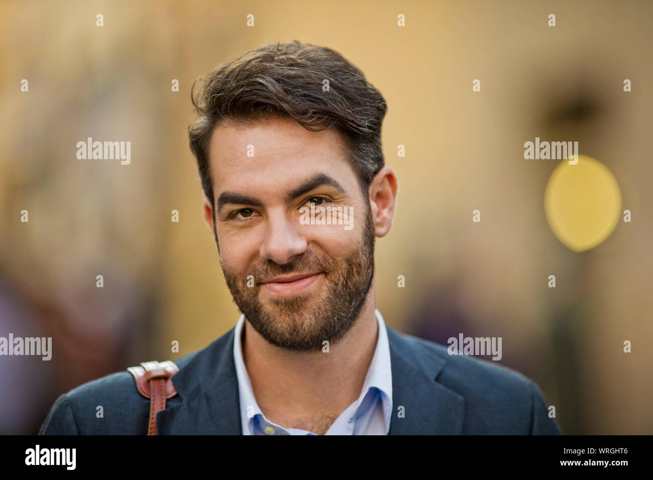 Portrait of a young businessman heading to work Stock Photo - Alamy