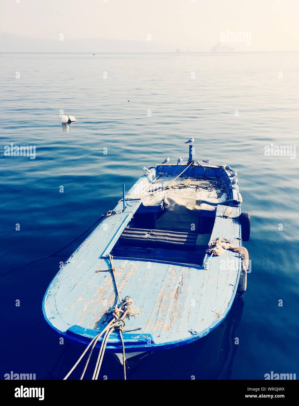 Small boat at the sea hi-res stock photography and images - Alamy
