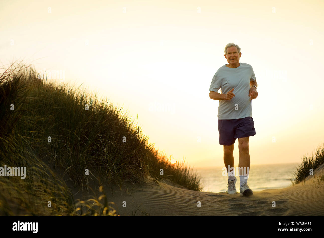 Two men enjoying sunset hi-res stock photography and images - Alamy