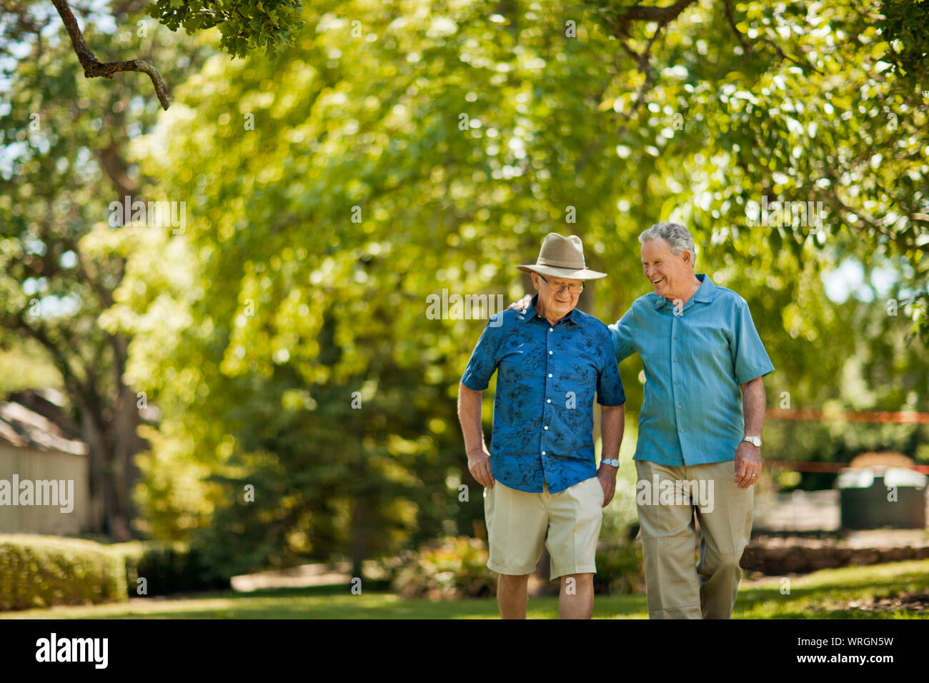 Man walks through park hi-res stock photography and images - Alamy