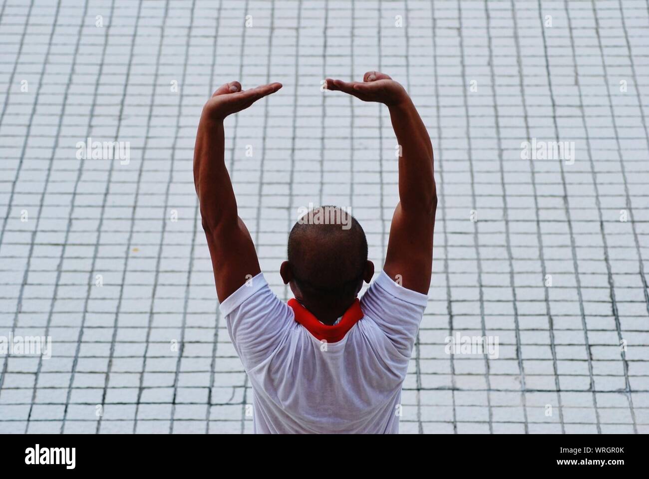 Man hands stretching hi-res stock photography and images - Alamy