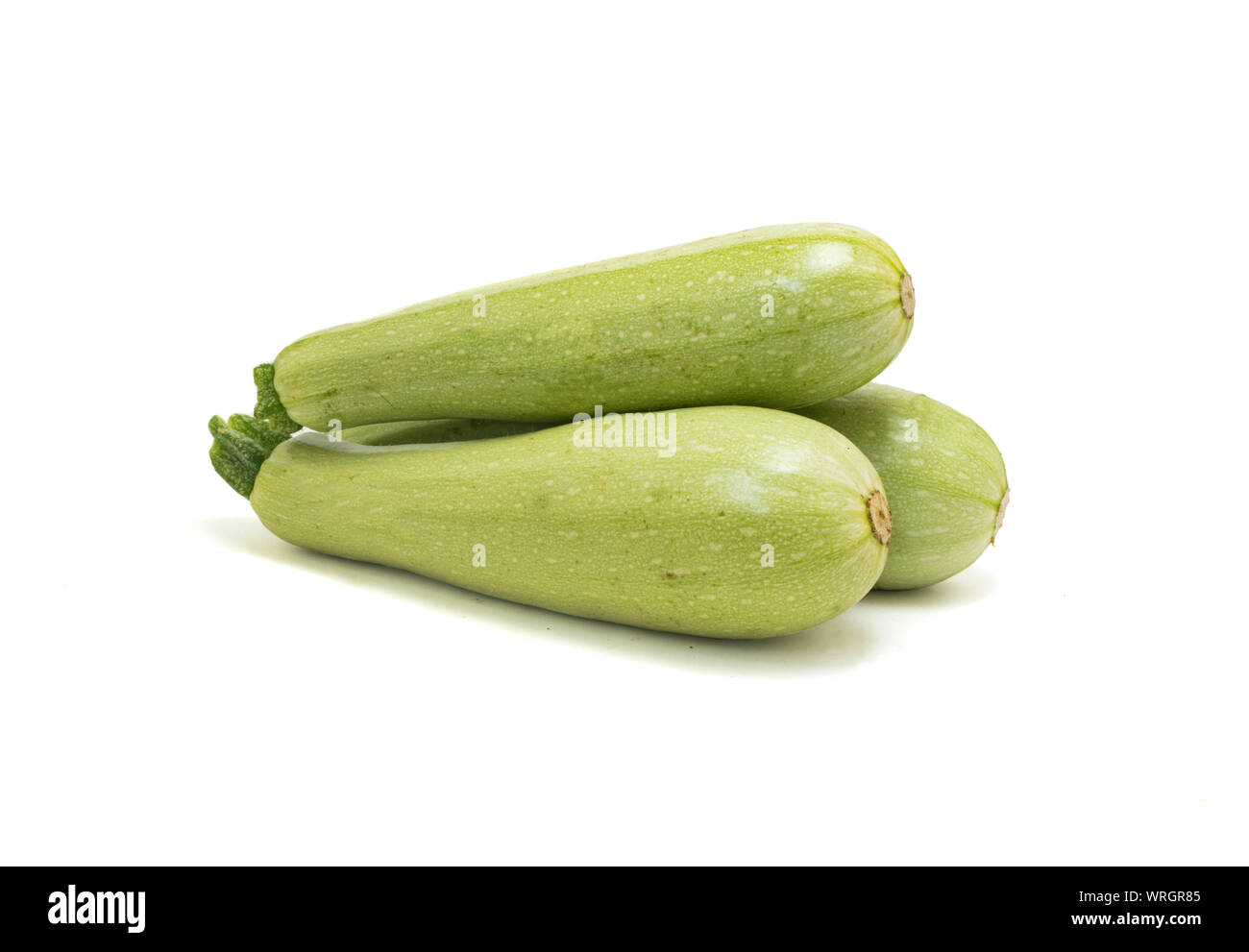 zucchini isolated on white Stock Photo - Alamy