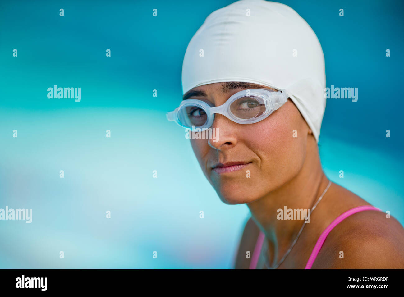 Portrait Of A Middle Aged Woman Wearing Swimming Cap And Goggles Stock