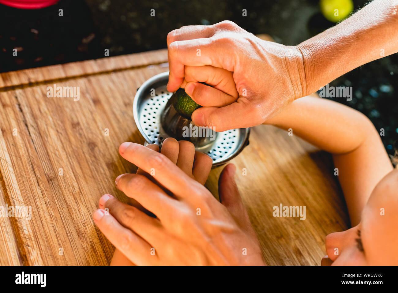 Mommy helping child to cook Stock Photo - Alamy