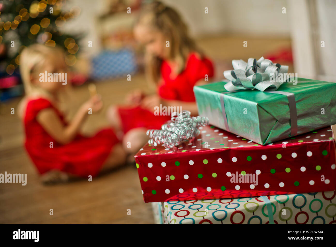Two young girls on Christmas day Stock Photo - Alamy