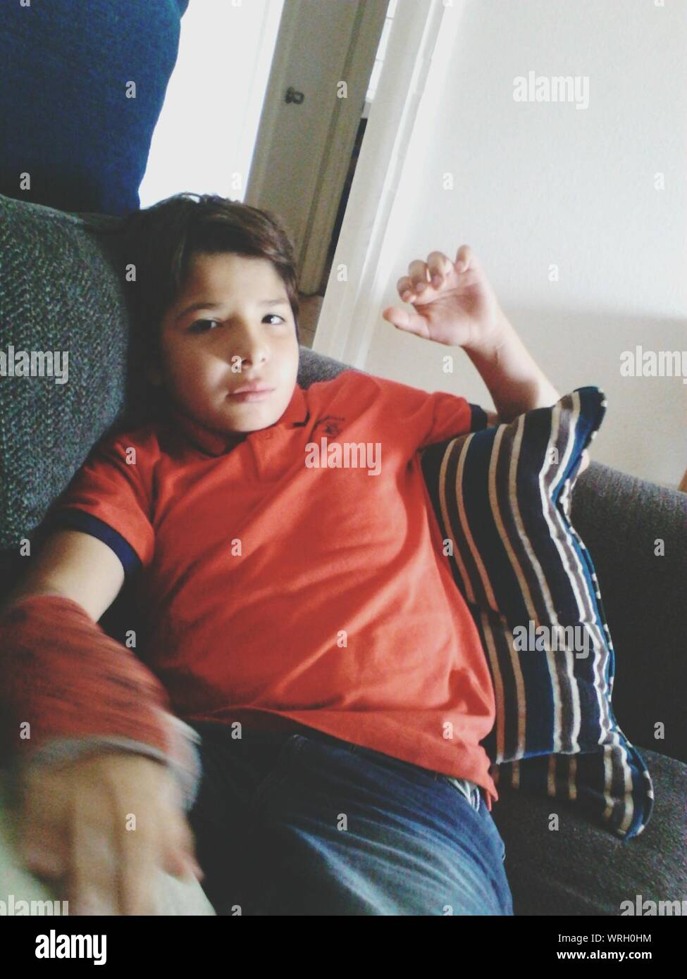 Boy relaxing home caucasian hi-res stock photography and images - Alamy