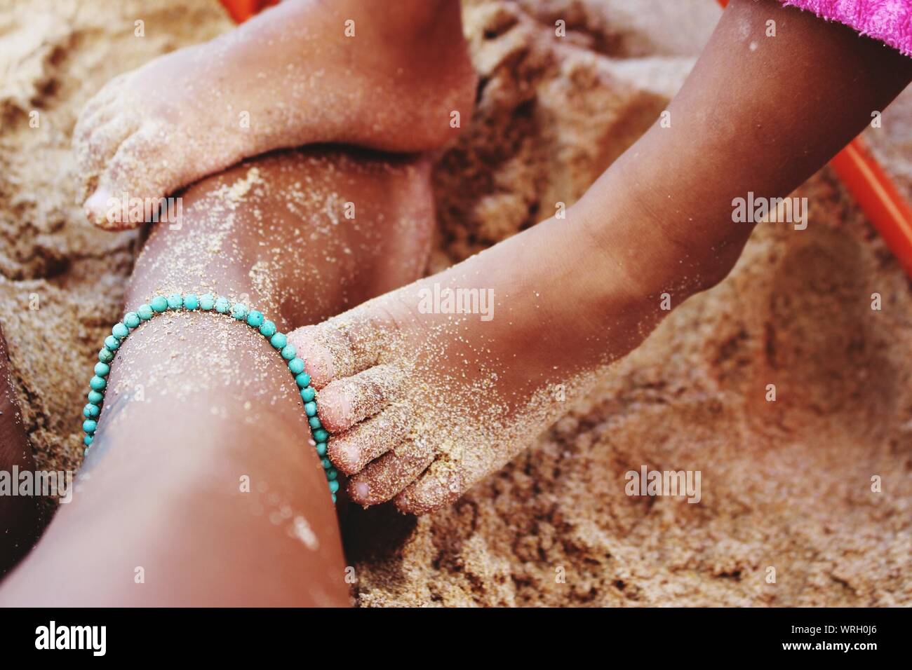 Child feet sand hi-res stock photography and images - Alamy