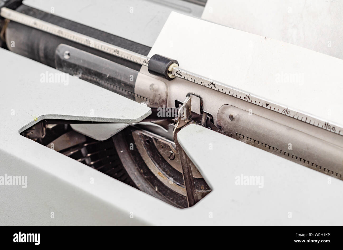 Carriage with letters in a mechanical typewriter. Letter pressed ...