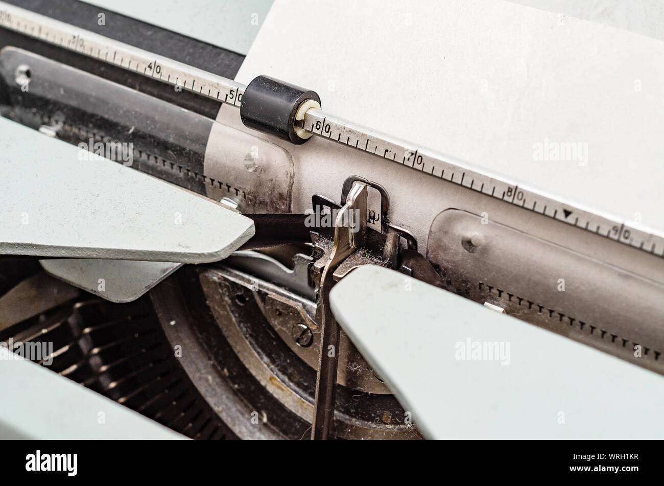 Carriage with letters in a mechanical typewriter. Letter pressed ...