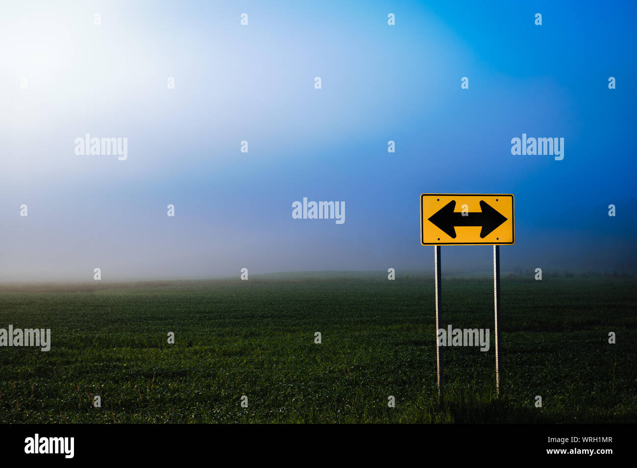 Directional road sign in front of a corn field, Stowe, Vermont, USA ...