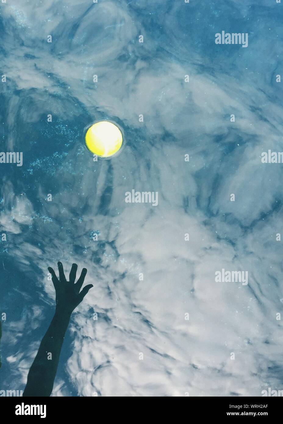 Hand reaching sun hi-res stock photography and images - Alamy