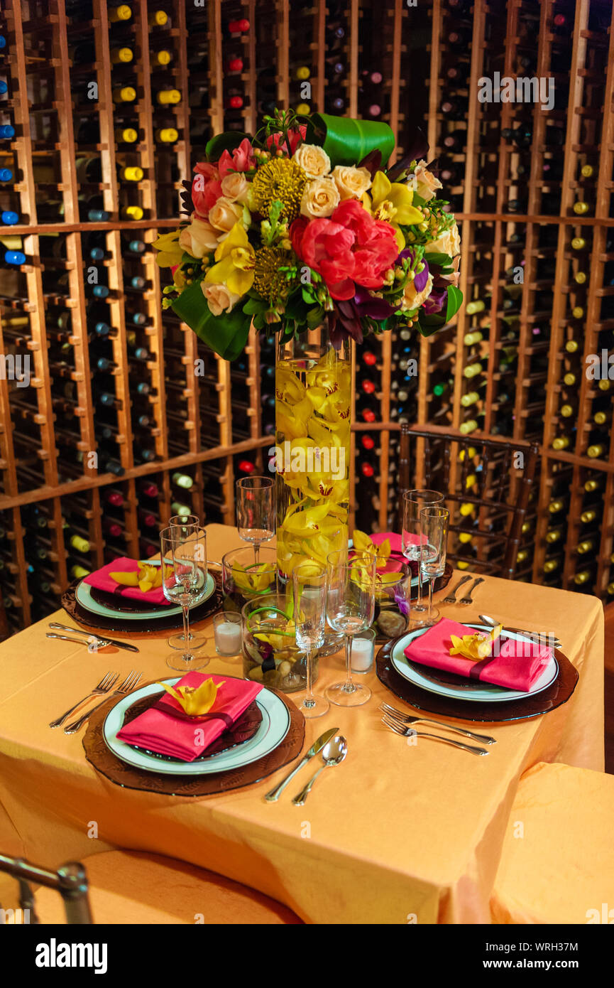 Fancy dinner setting for an event in a wine cellar Stock Photo - Alamy