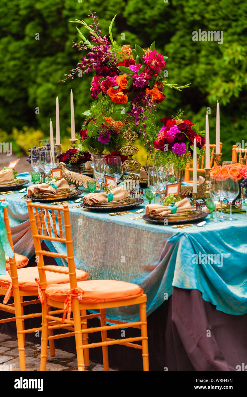 Fancy outdoor event table and plate setting with various flowers Stock ...
