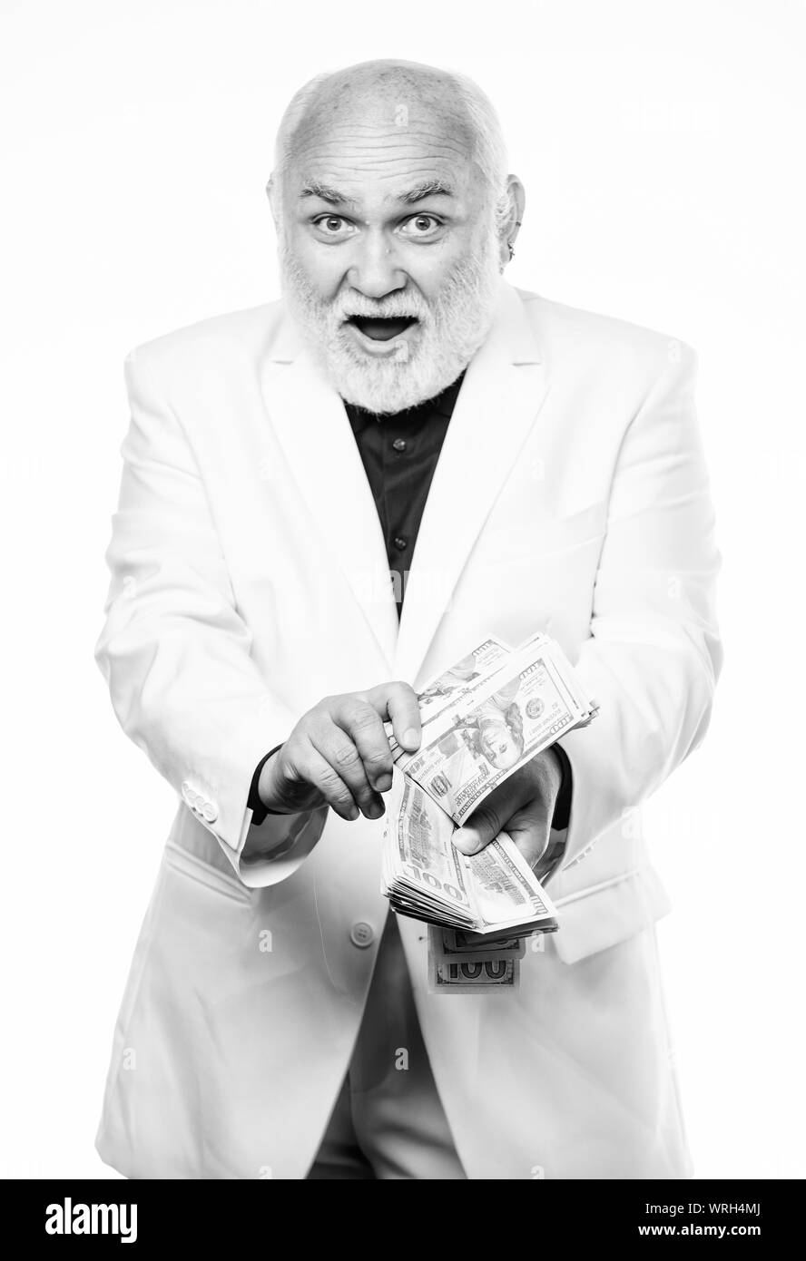 fake money. mature bearded man with dollar banknotes. successful ...