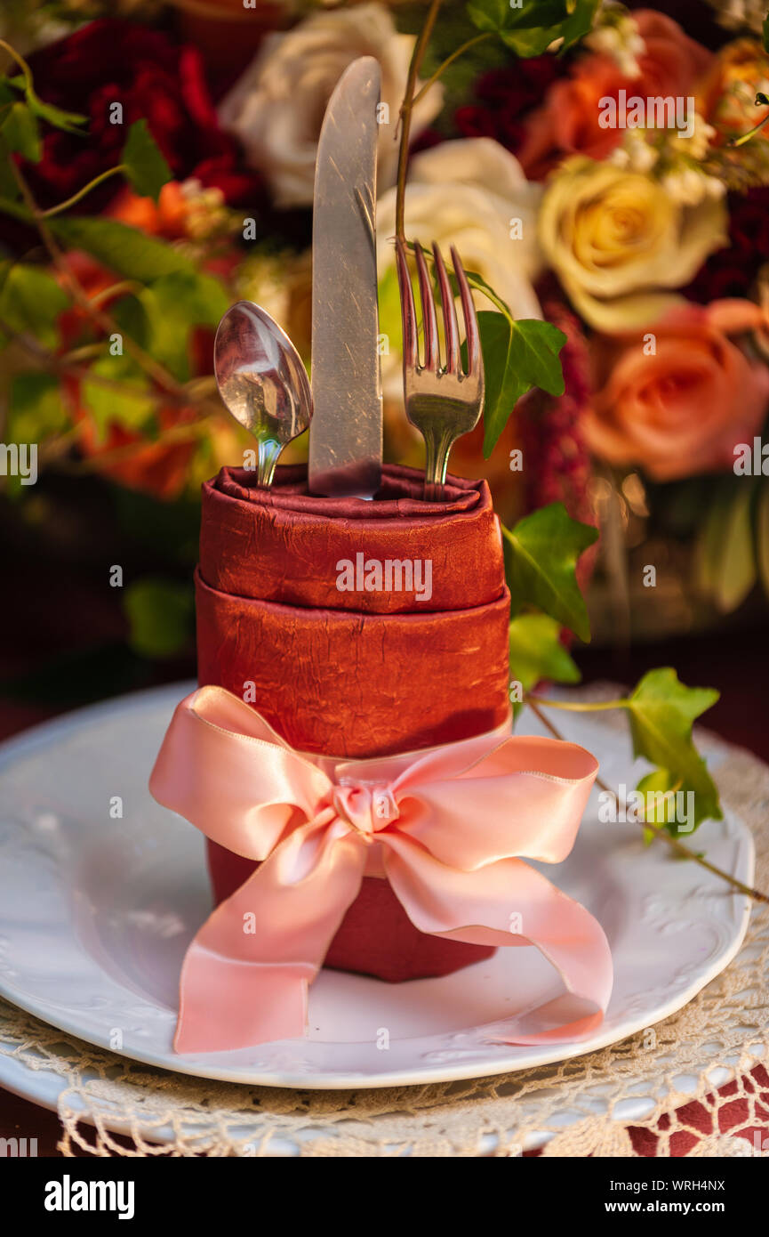 A fancy dinner plate setting for a wedding event Stock Photo - Alamy