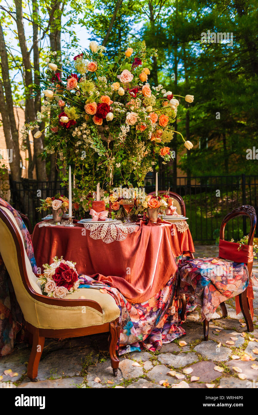 A fancy outdoor dinner table setiing Stock Photo - Alamy